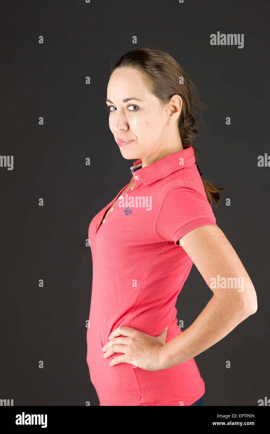 Model in studio isolated on plain grey background Stock Photo - Alamy