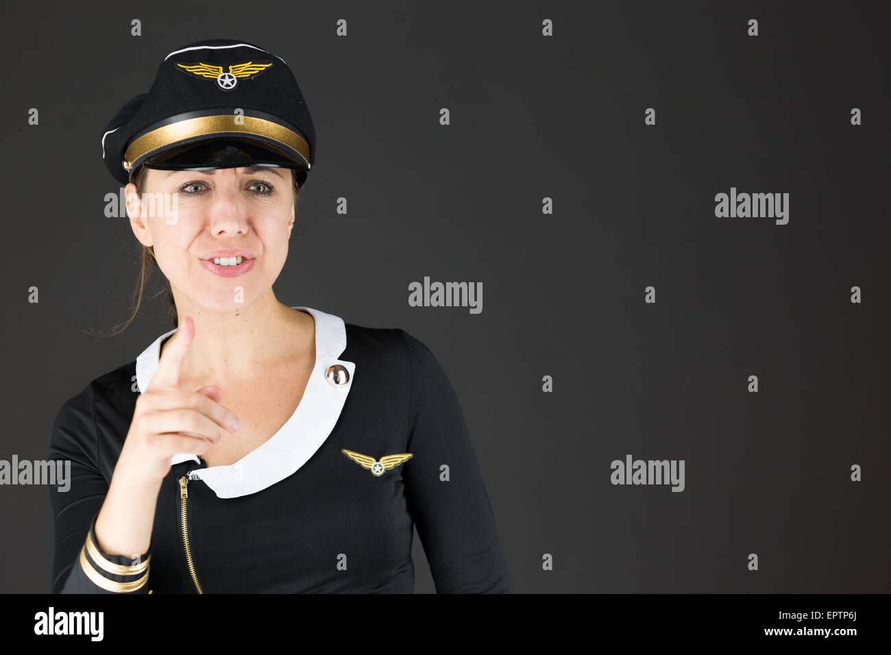 Model in studio isolated on plain grey background Stock Photo - Alamy