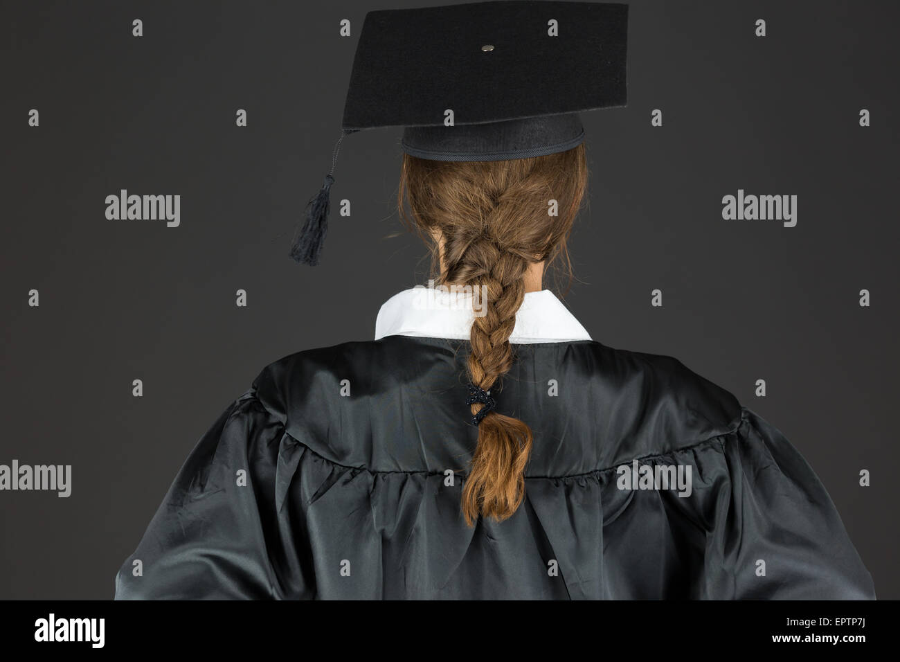 Model in studio isolated on plain grey background Stock Photo - Alamy