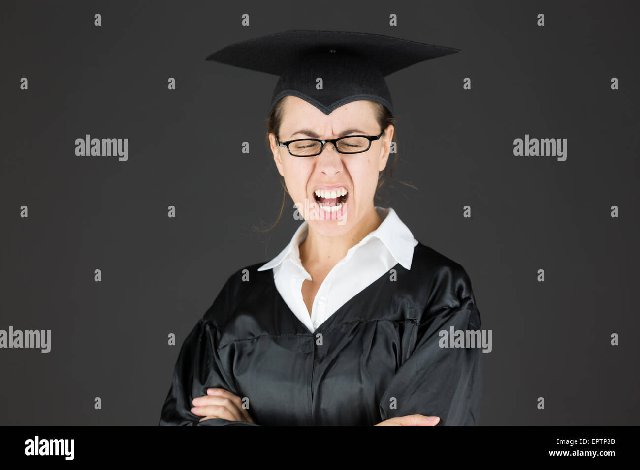 Model in studio isolated on plain grey background Stock Photo - Alamy