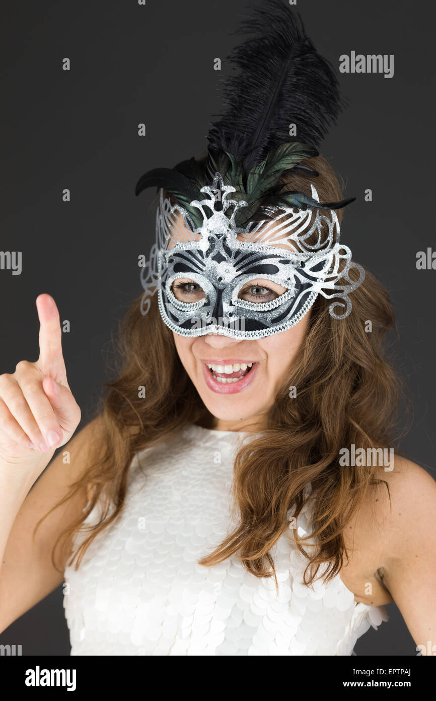 Model in studio isolated on plain grey background Stock Photo - Alamy