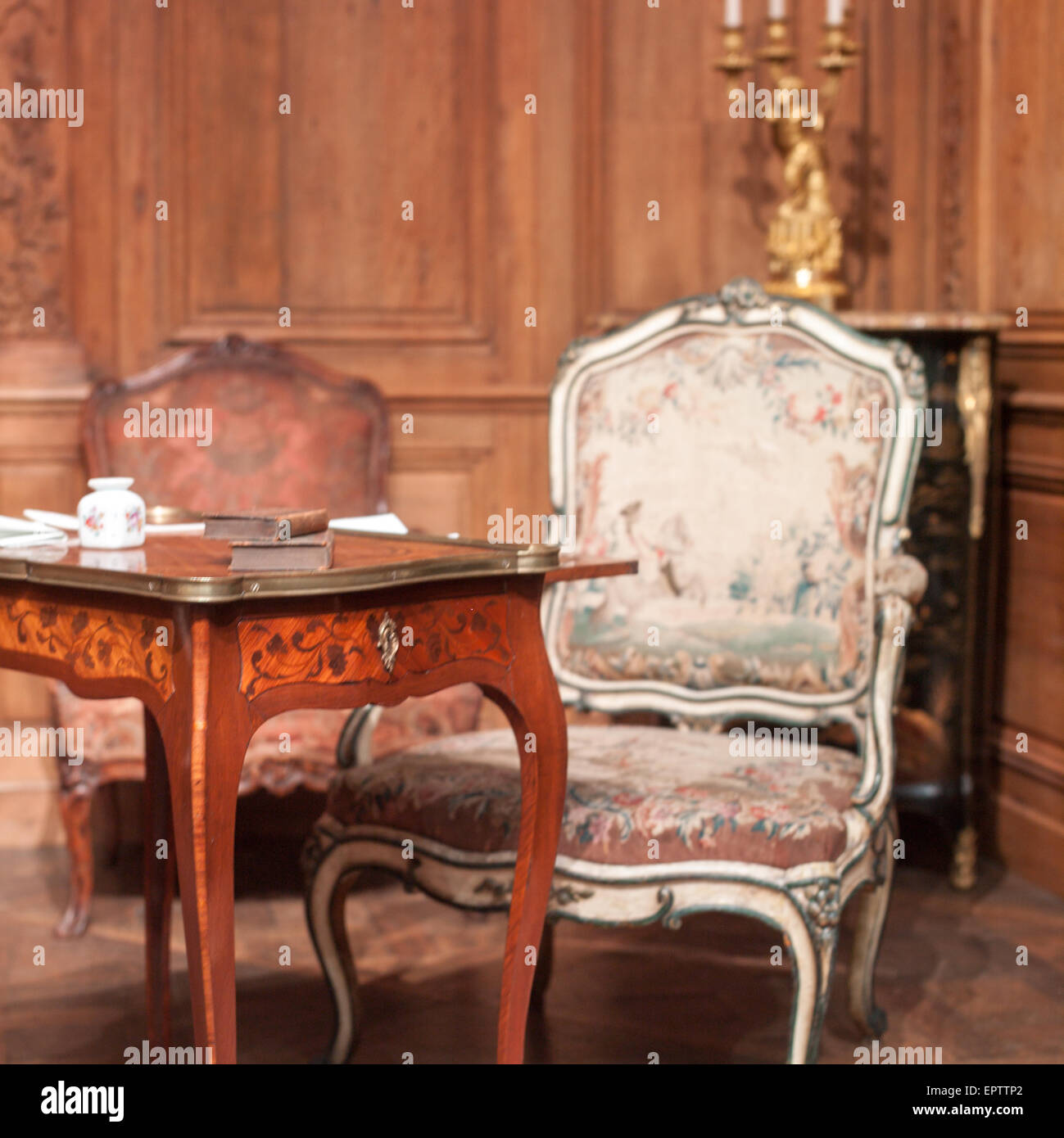 Table and chair in a museum Stock Photo - Alamy