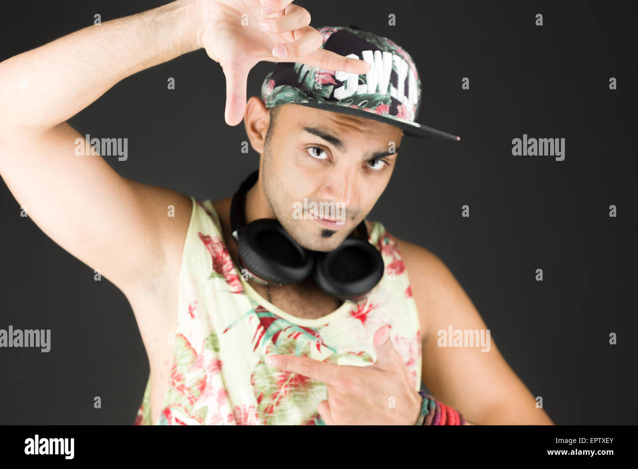 Model in studio isolated on plain grey background Stock Photo - Alamy