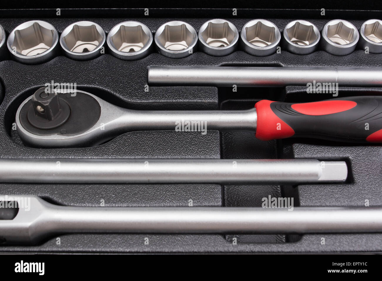 set of metal automobile tools located in individual cells Stock Photo ...