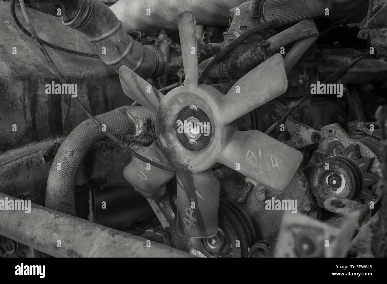 An old broken car engine left to rot Stock Photo - Alamy