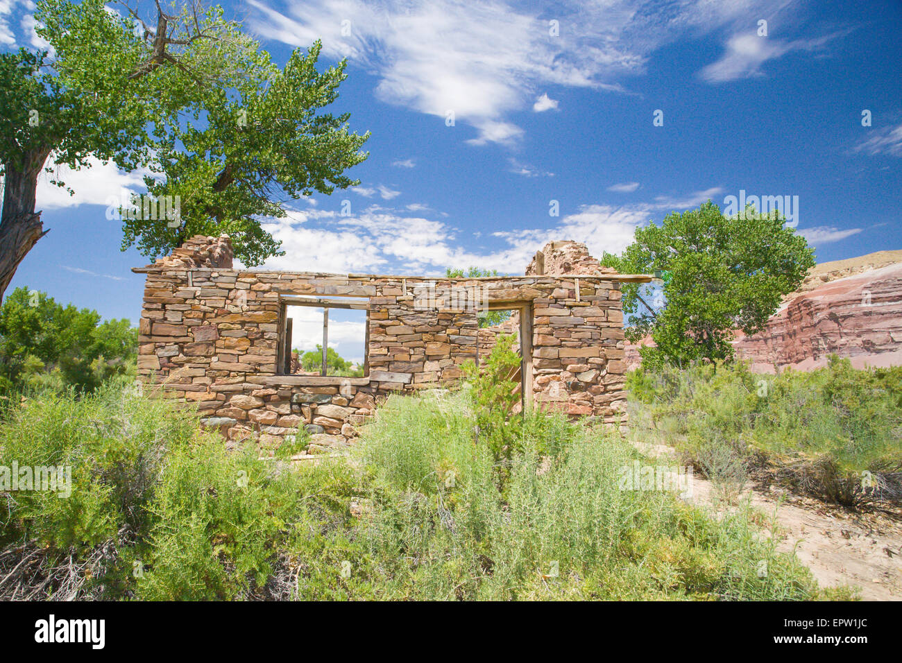 Rustic old homestead built of stone in the midst of the Utah wilderness ...