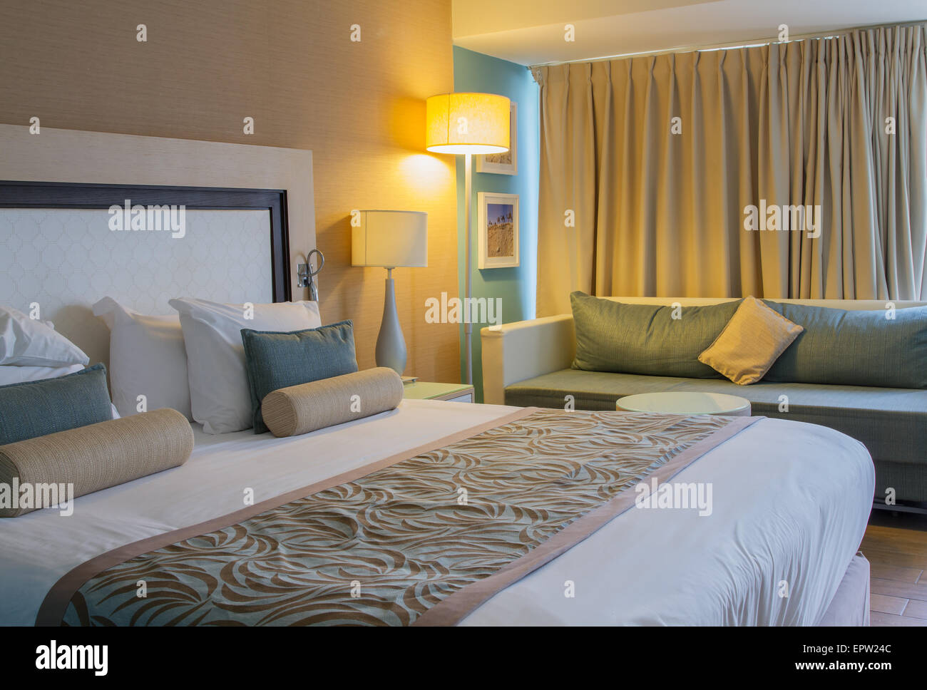 Beautiful interior of a bedroom at the hotel Stock Photo - Alamy