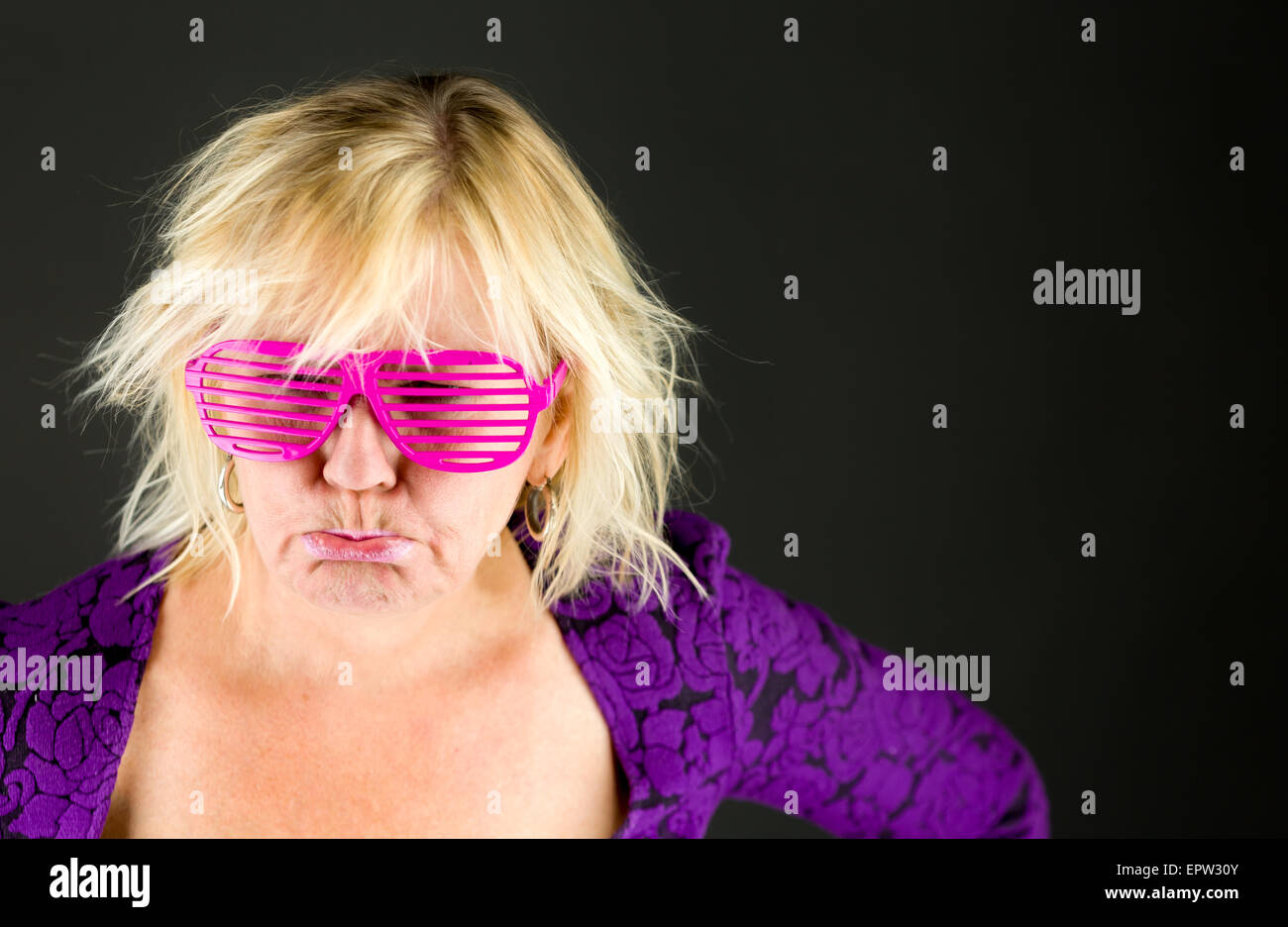 Model in studio isolated on plain grey background Stock Photo - Alamy