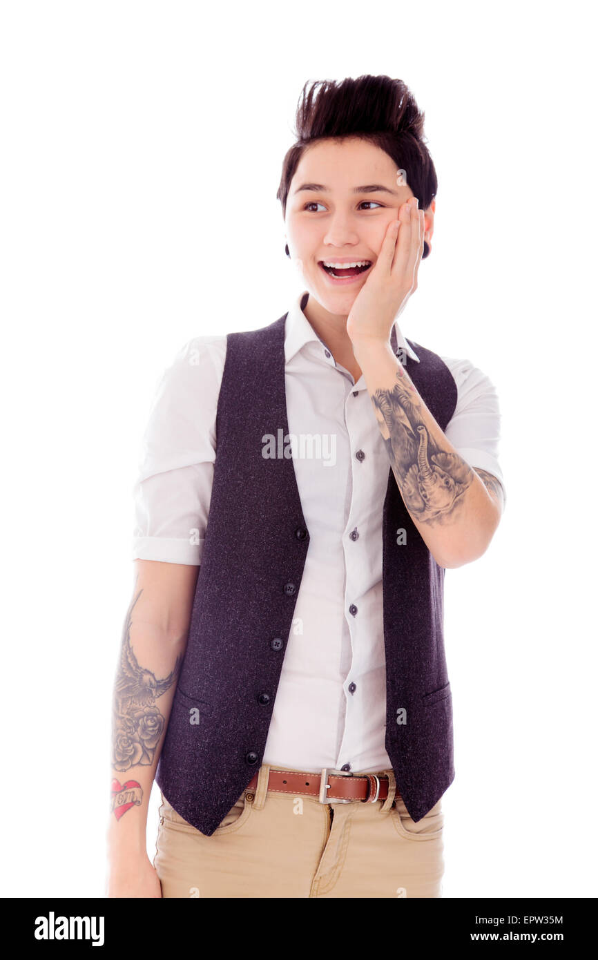 Young woman smiling with her hand on cheek Stock Photo - Alamy