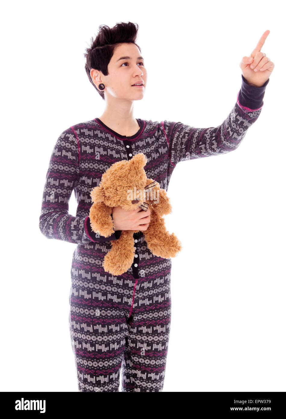 Young woman pointing and holding her teddy bear Stock Photo - Alamy