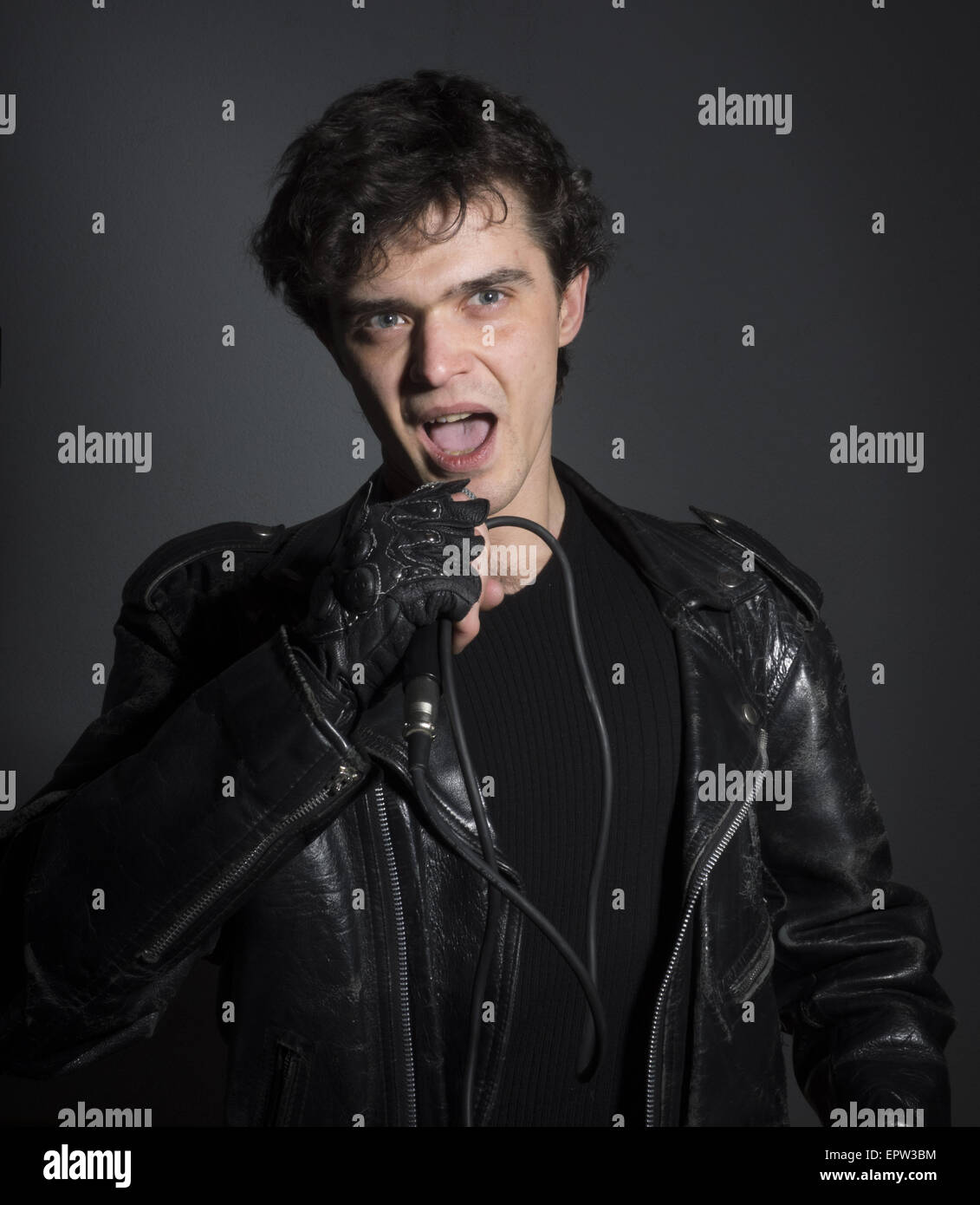 Feb. 21, 2014 - Rock singer screaming on the microphone © Igor ...