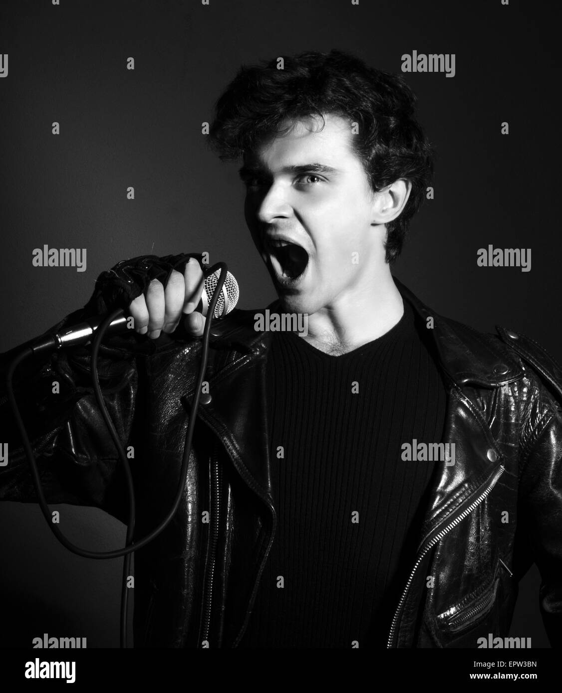 Feb. 21, 2014 - Rock singer screaming on the microphone © Igor ...