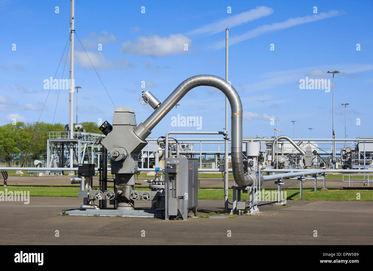 Modern equipment at a natural gas processing site. Production causes ...