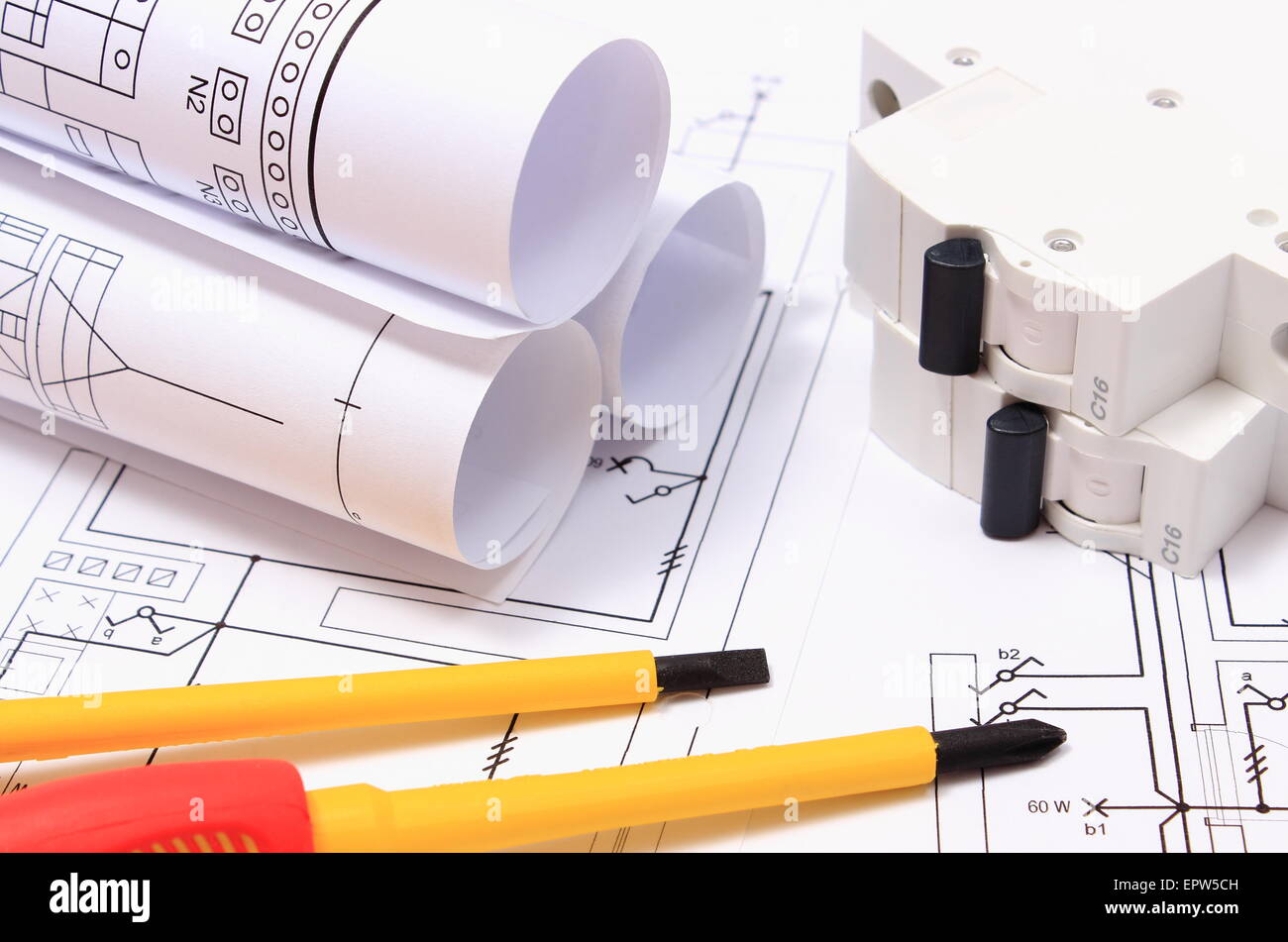 Screwdriver, work tools, rolls of electrical diagrams and electric fuse ...