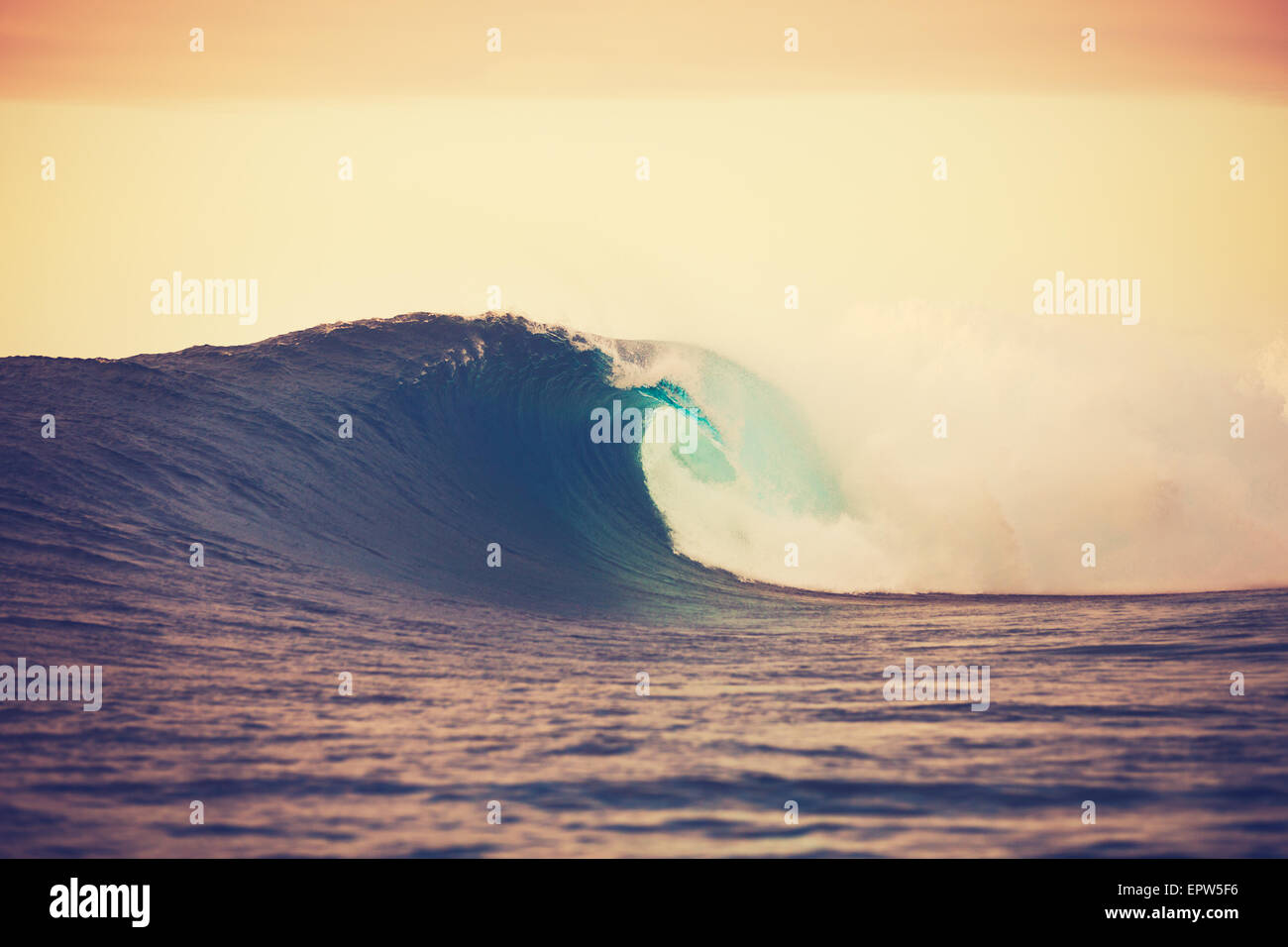 Amazing Ocean Wave Breaking at Sunset, Epic Surf Stock Photo - Alamy