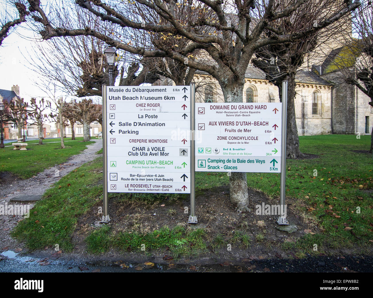 Signs in French village in Normandy indicating the direction of Utah ...