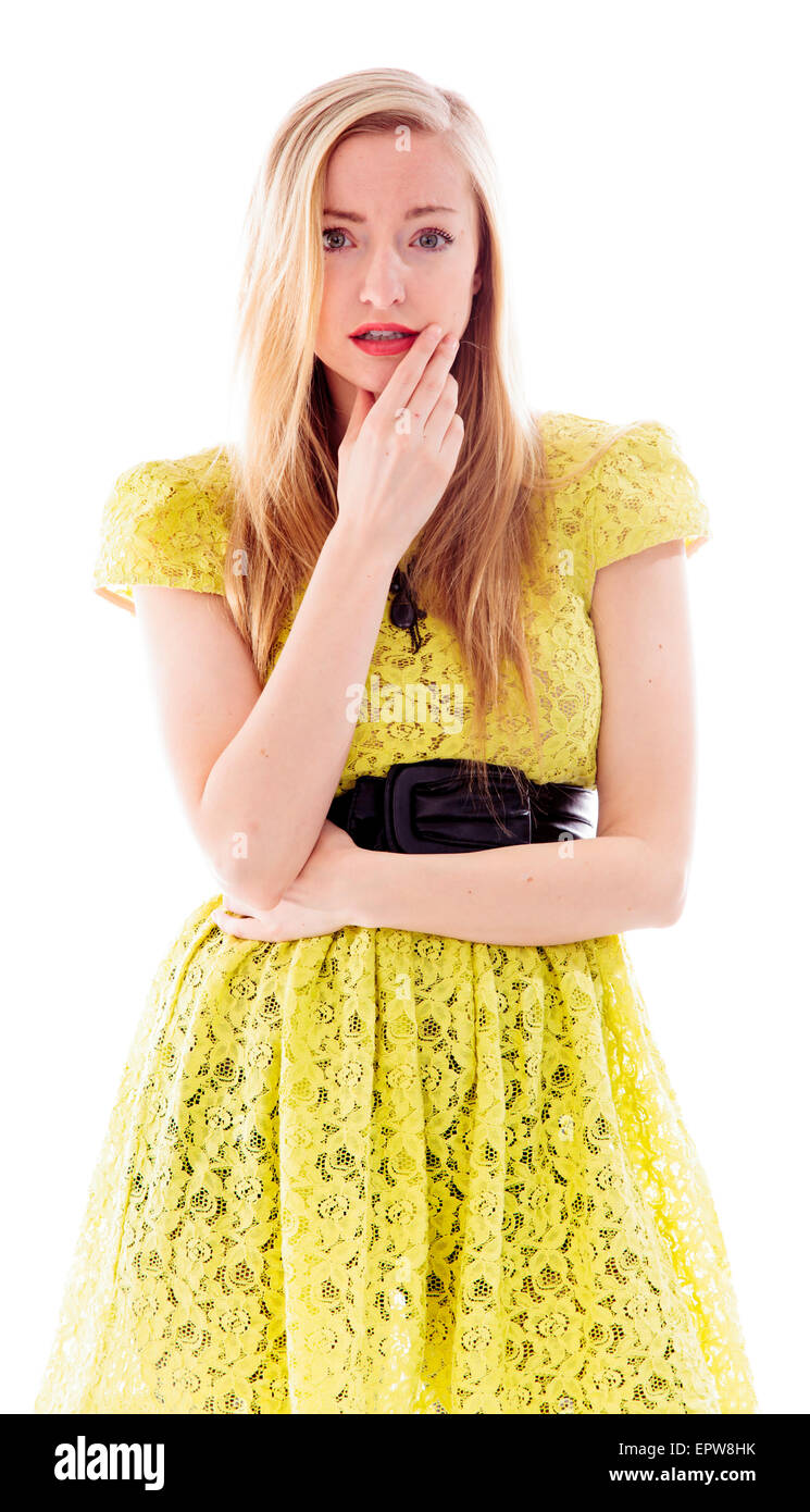 Beautiful young woman standing and looking serious Stock Photo - Alamy