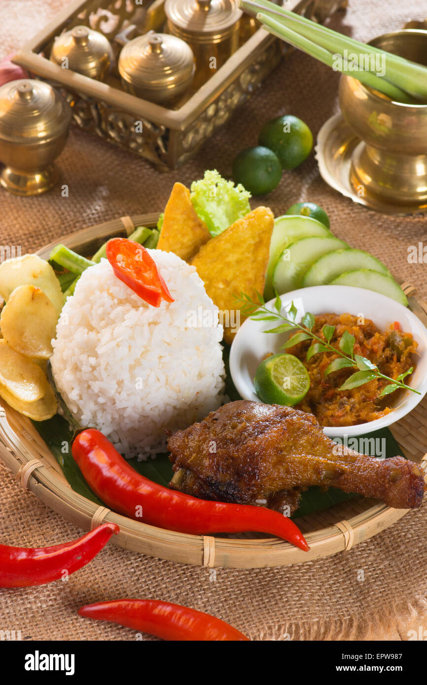 indonesian fried chicken rice Stock Photo - Alamy