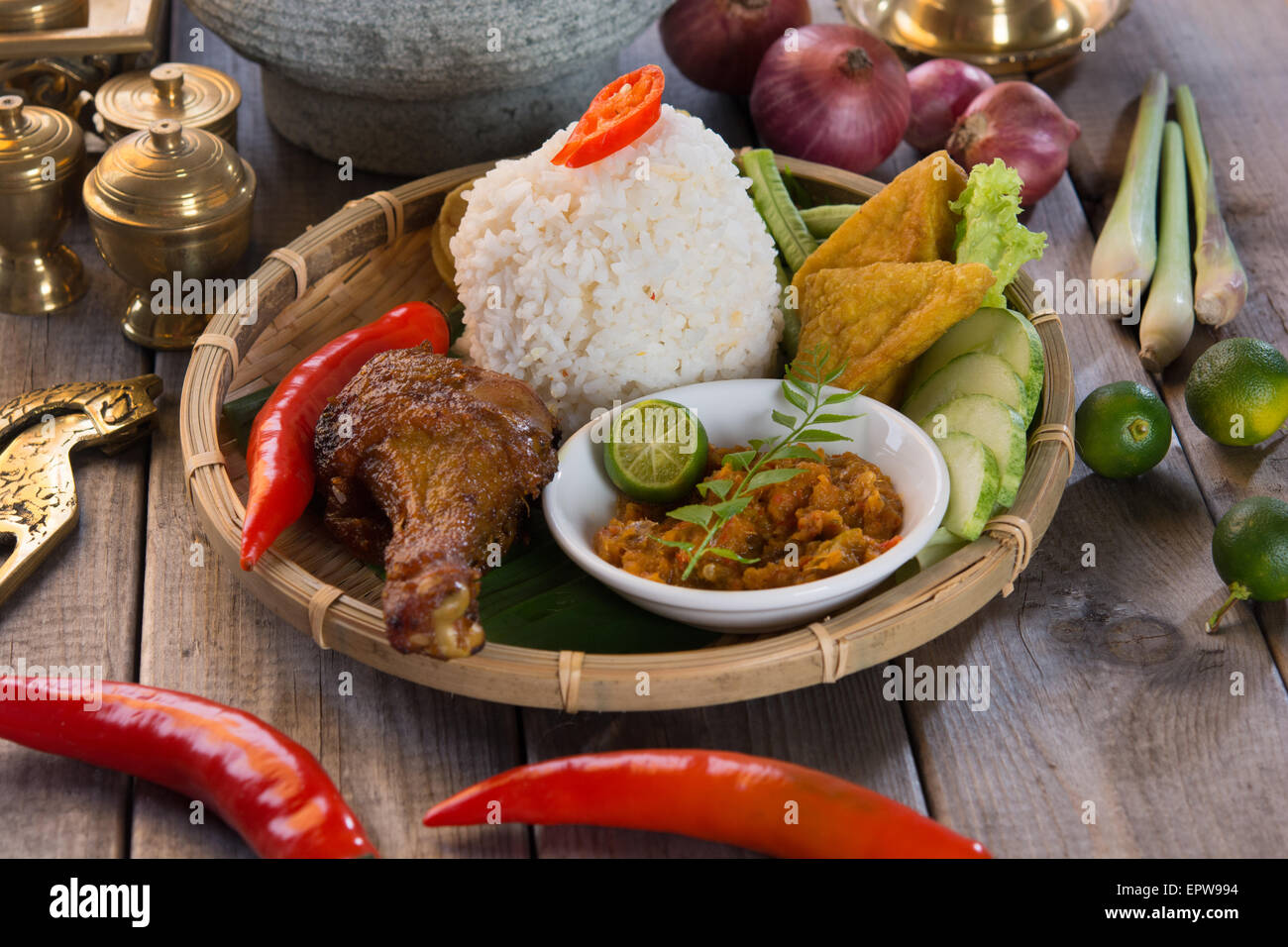 indonesian fried chicken rice Stock Photo - Alamy