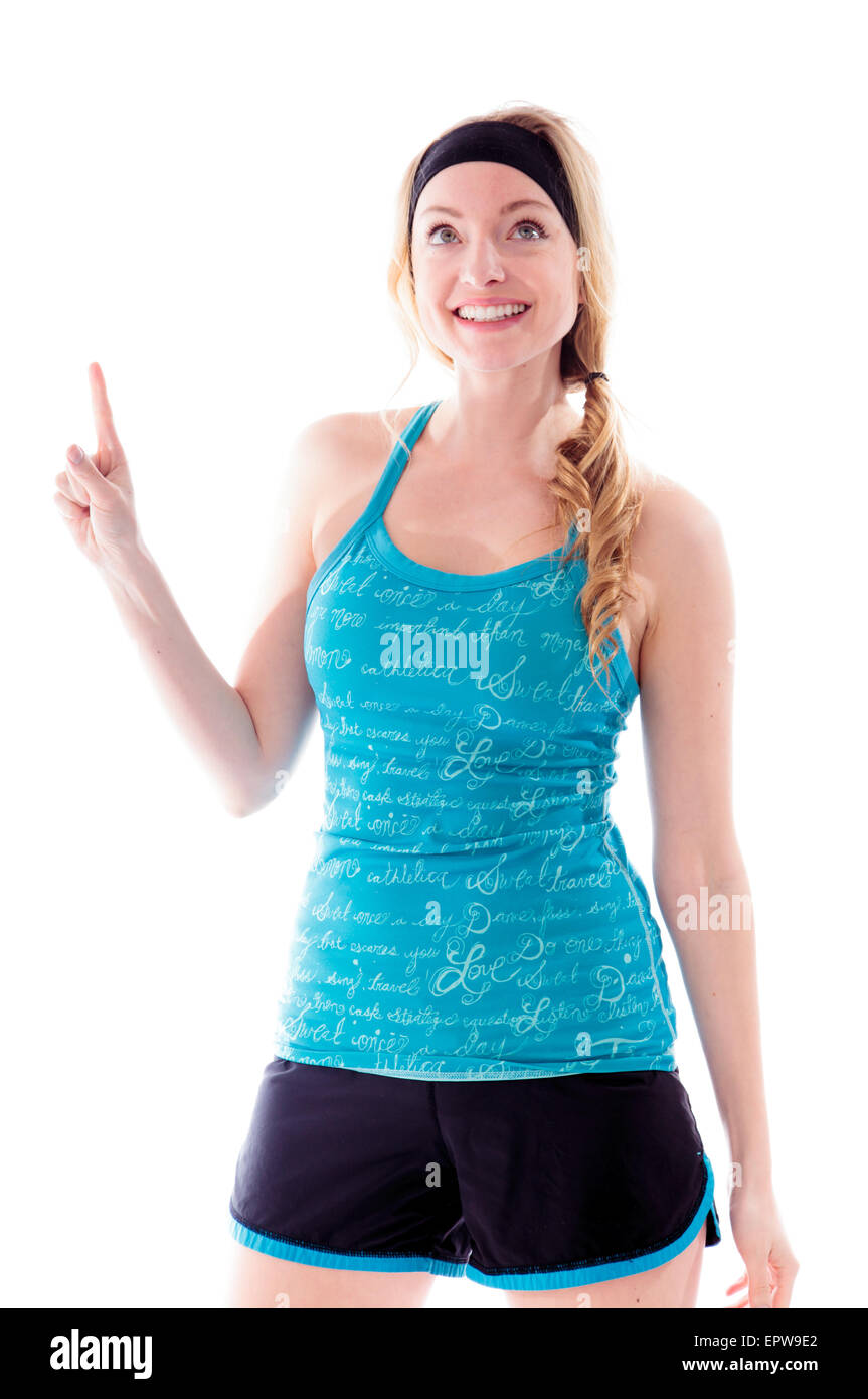 Young smiling woman pointing hi-res stock photography and images - Alamy