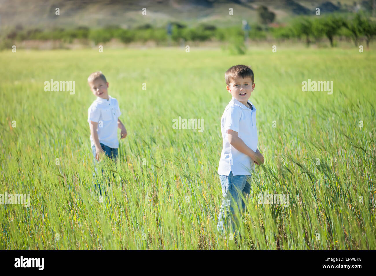 Cute boy walking hi-res stock photography and images - Alamy