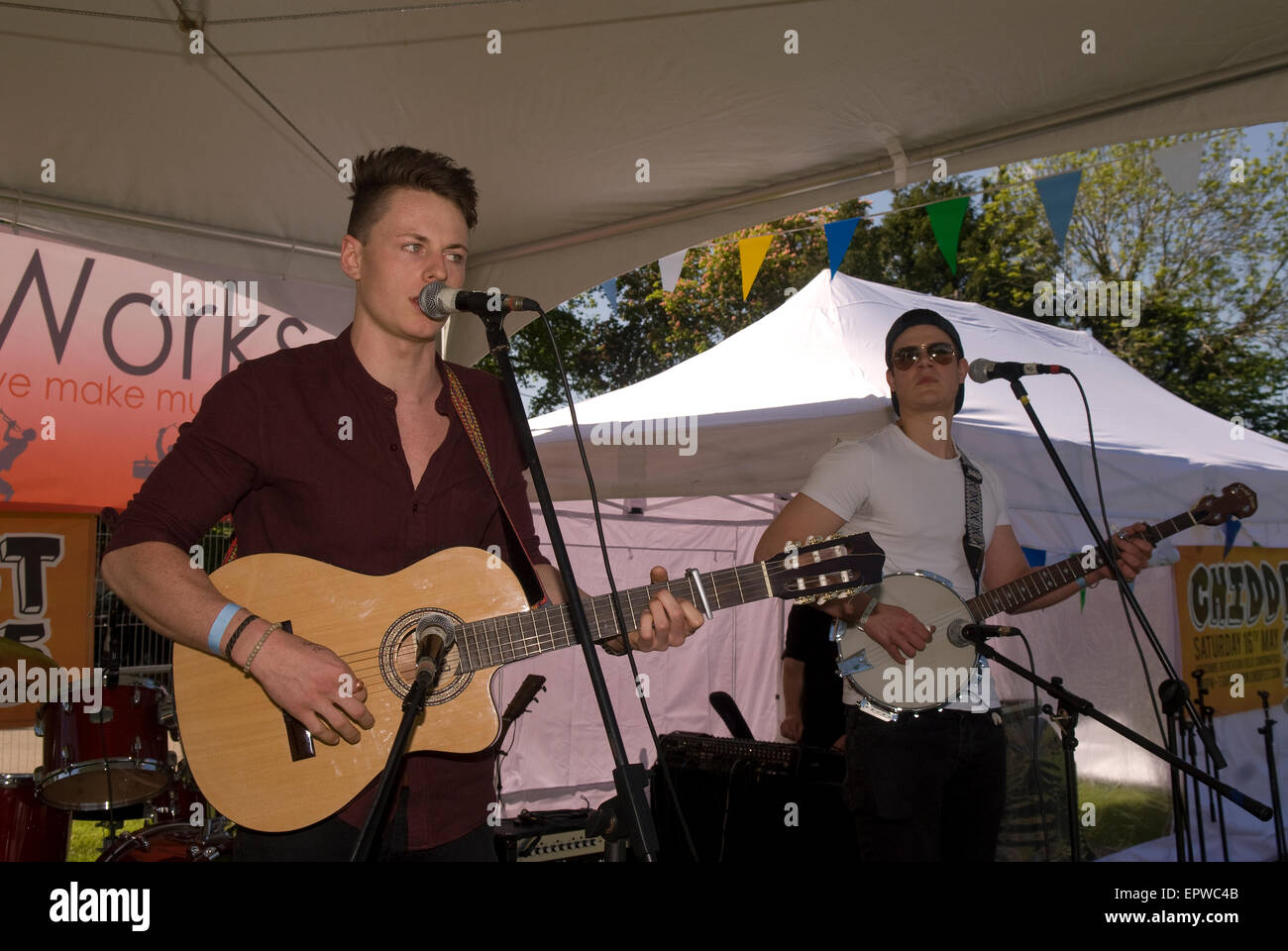Folk band Dan & Charlie performing on stage at a local music festival ...