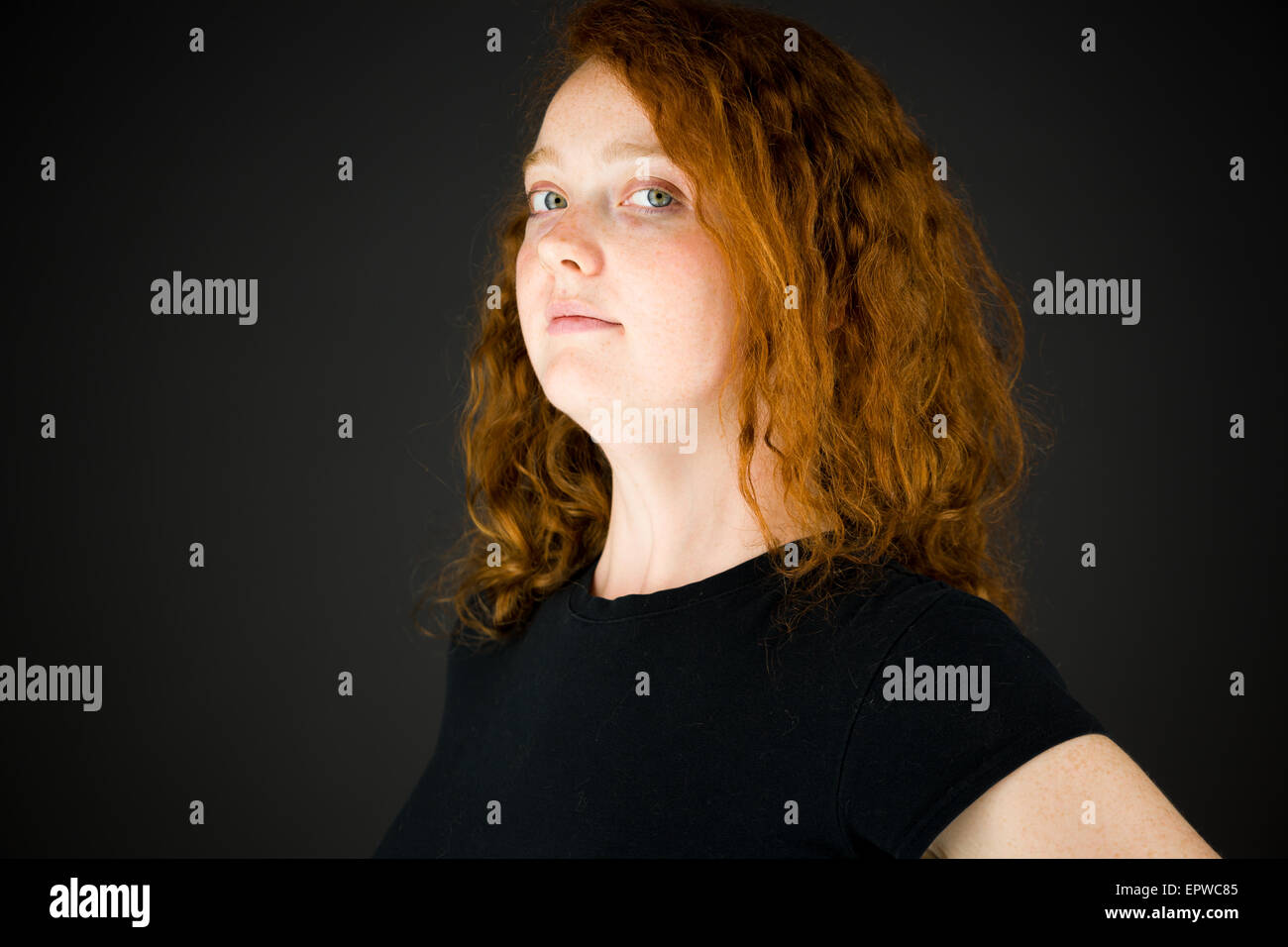 Model in studio isolated on plain grey background Stock Photo - Alamy