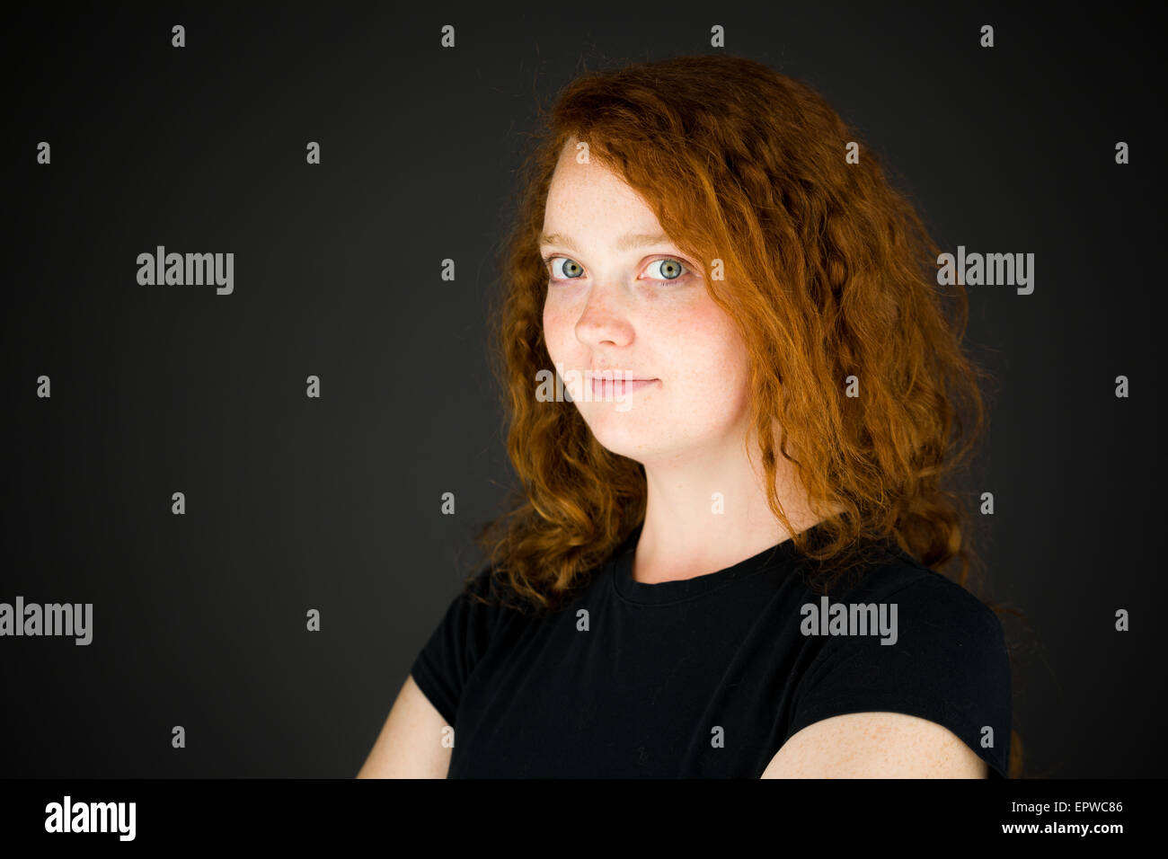 Model in studio isolated on plain grey background Stock Photo - Alamy