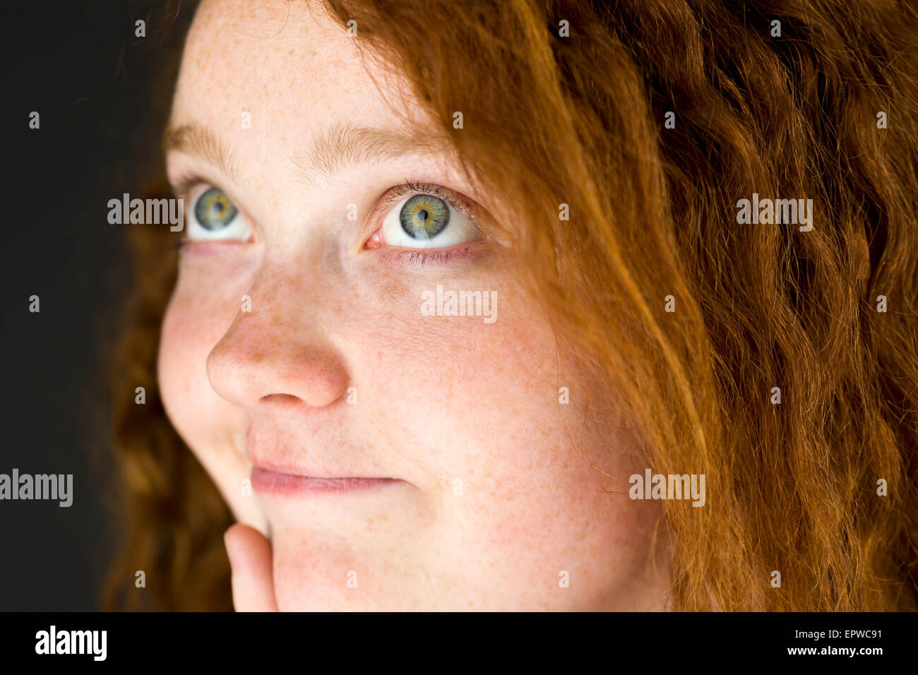 Model in studio isolated on plain grey background Stock Photo - Alamy