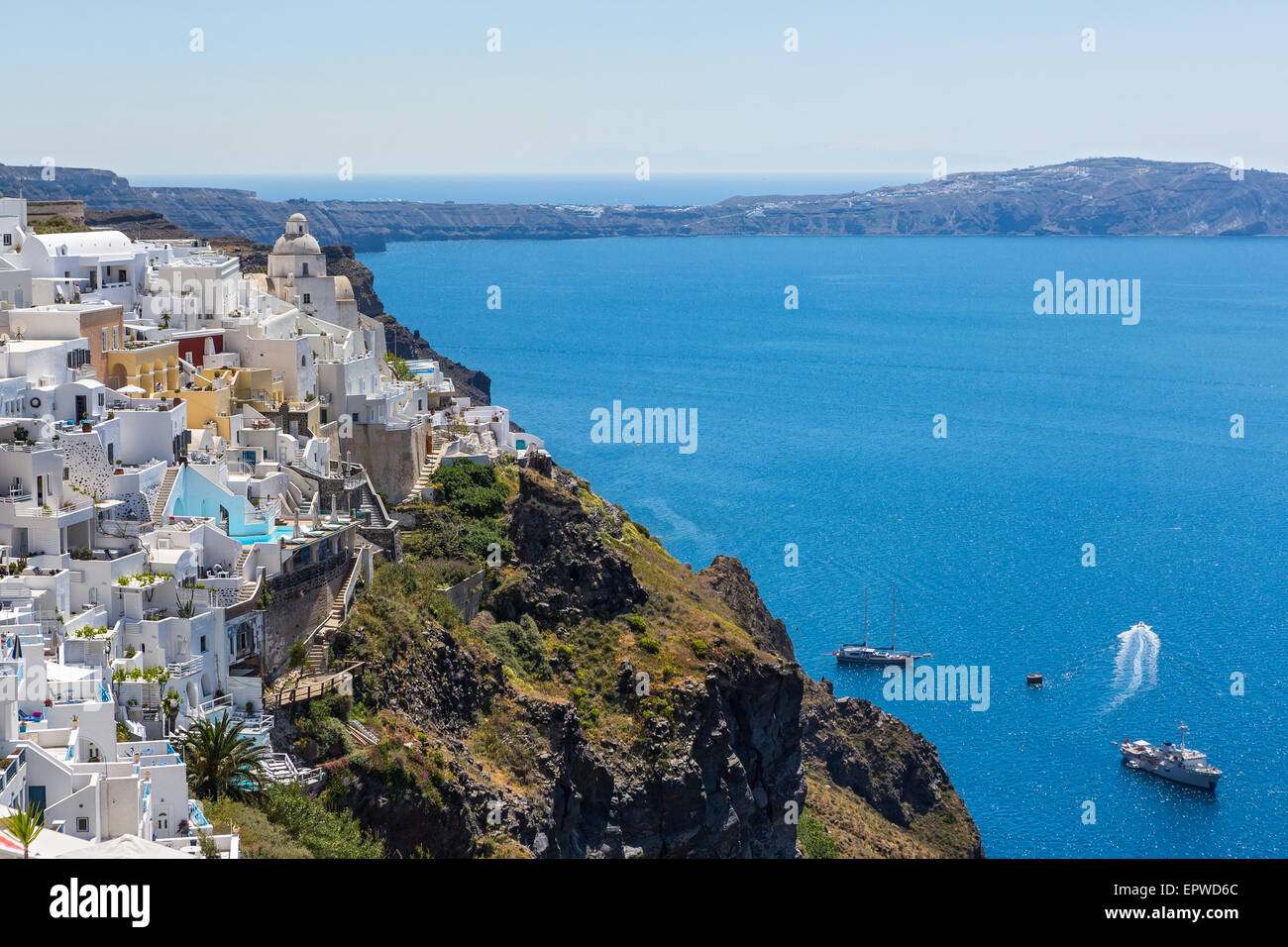 Greece, Santorini, Fira town. Morning view of the building and the Bay ...