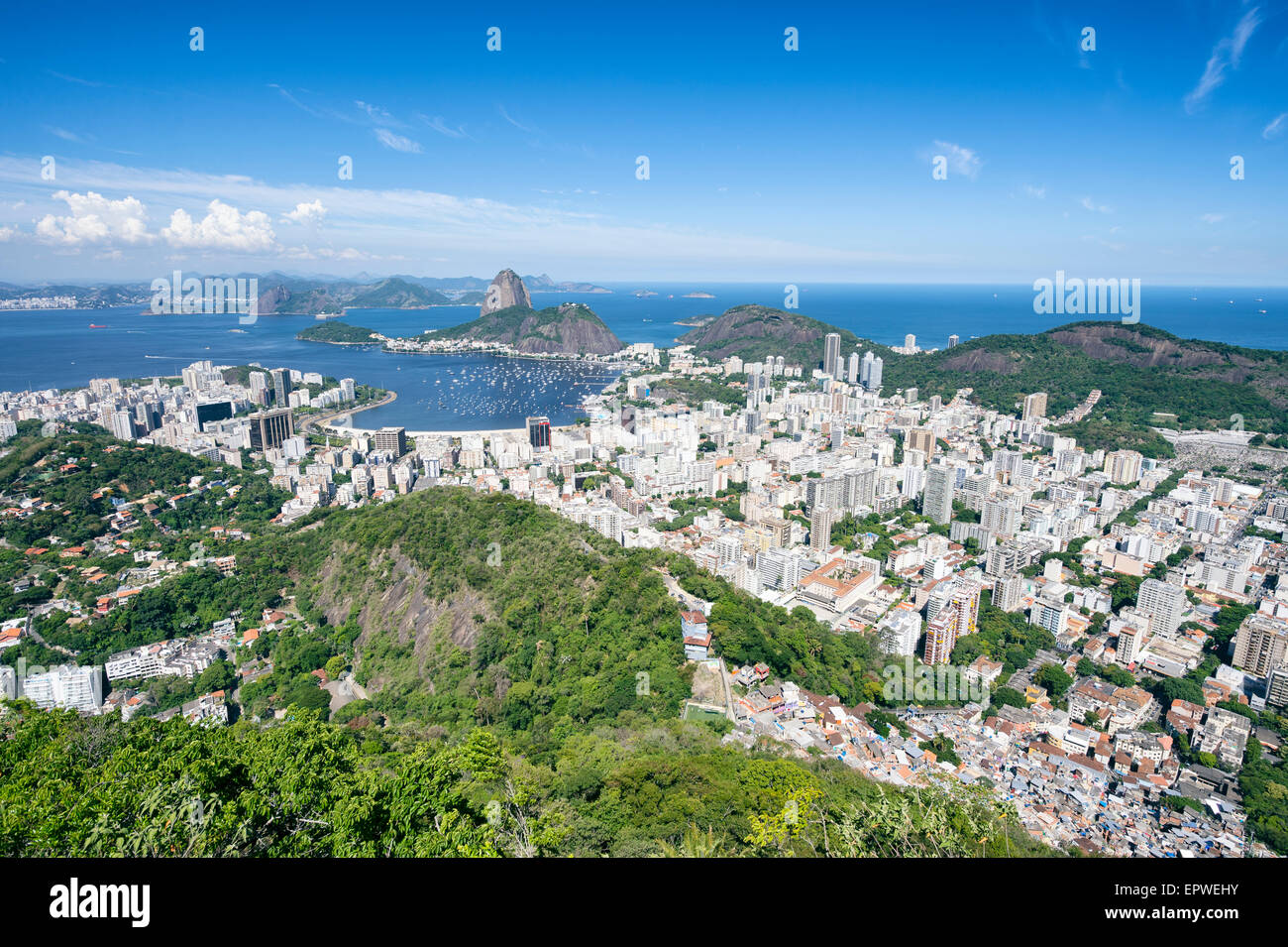 Bright scenic overlook of Rio de Janeiro city skyline with Sugarloaf ...