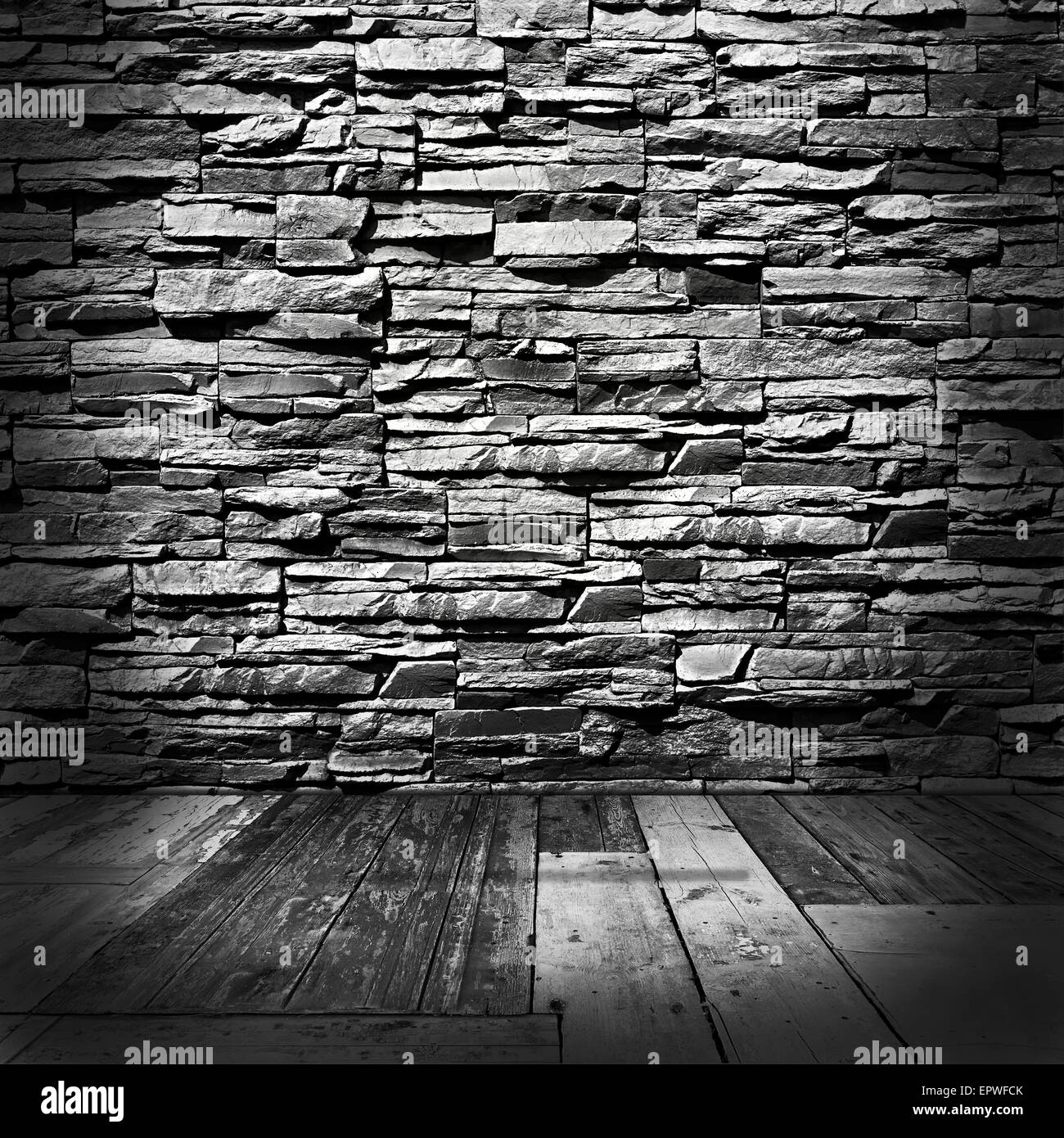 room with a stone wall and wooden floor in grunge style Stock Photo - Alamy