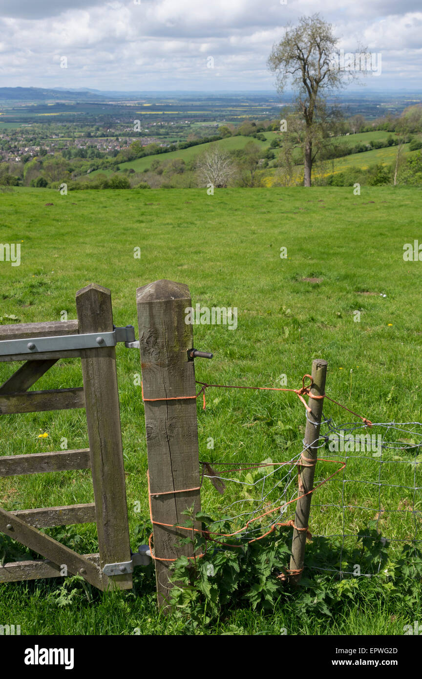 Gate and post in the english countryside with vale of Evesham in the ...