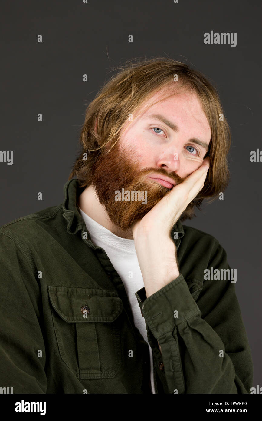 Model in studio isolated on plain grey background Stock Photo - Alamy