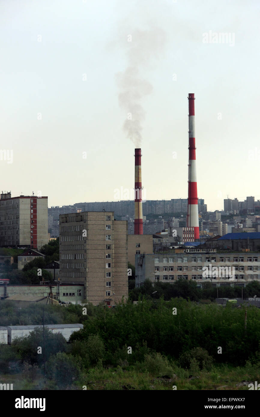 Smokestack, chimney, industrial plant, surrounded by a housing estate ...