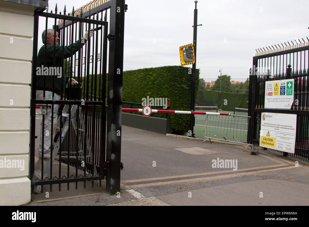 Wimbledon London, UK. 22nd May, 2015. Workmen paint the railings of the ...
