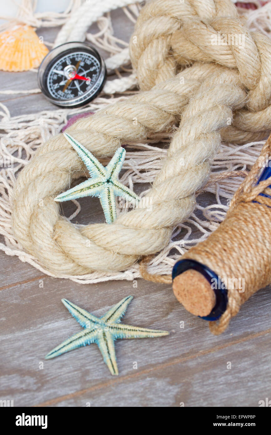 compass on fishing net Stock Photo - Alamy