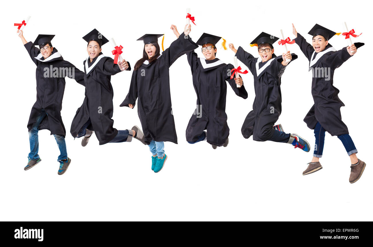 Happy student group in graduate robe jumping together Stock Photo - Alamy