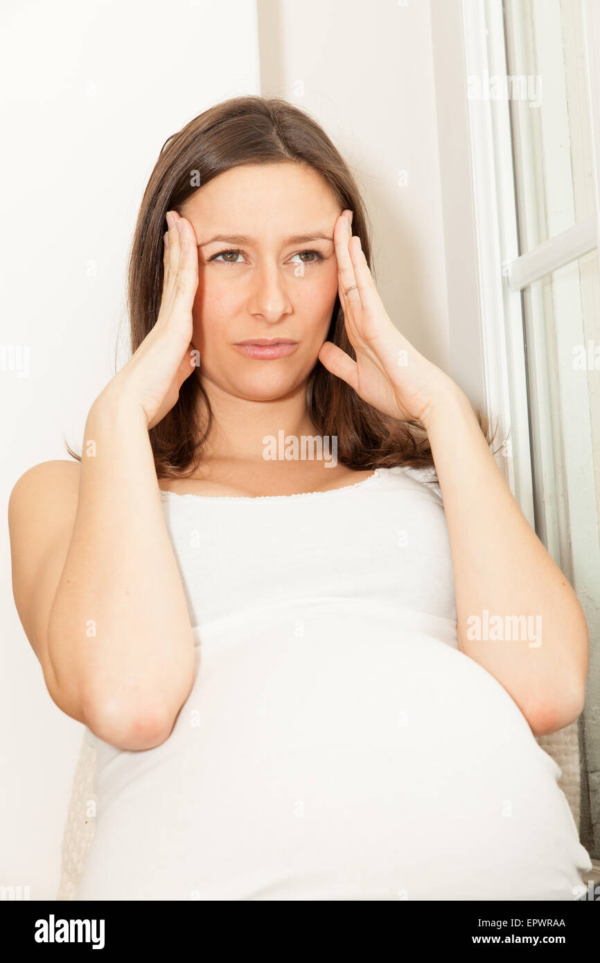 sad pregnant woman Stock Photo - Alamy