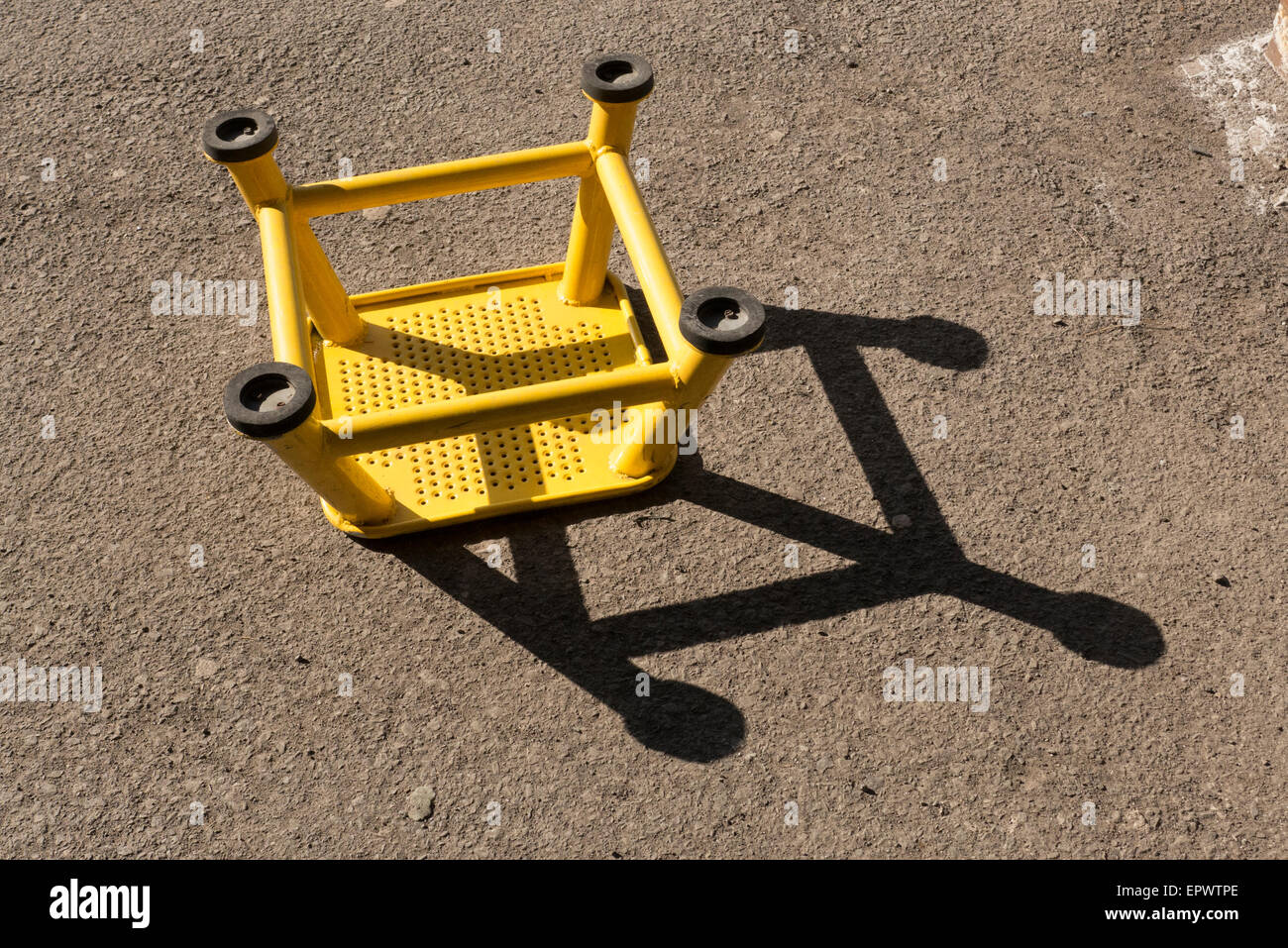 Yellow step stool at rail road depot Stock Photo - Alamy