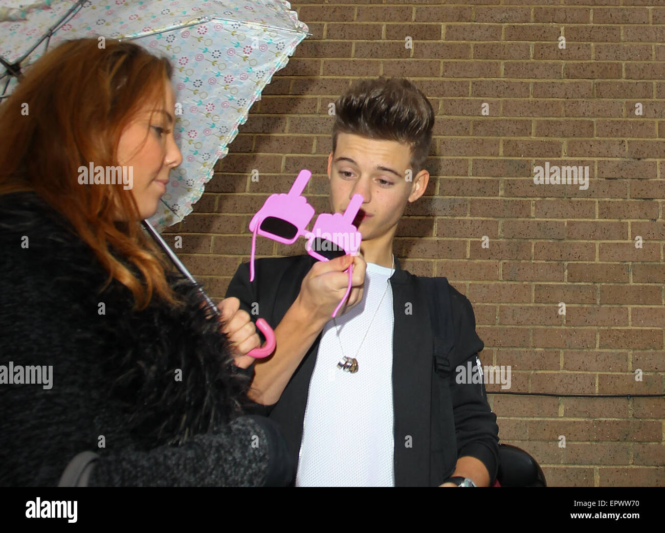 X Factor contestants arrive at a recording studio to rehearse for this ...