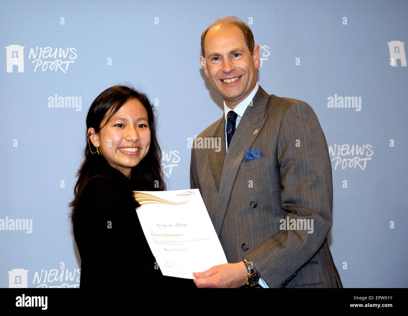 Britain's Prince Edward honors Michelle Ching during the Golden Award ...