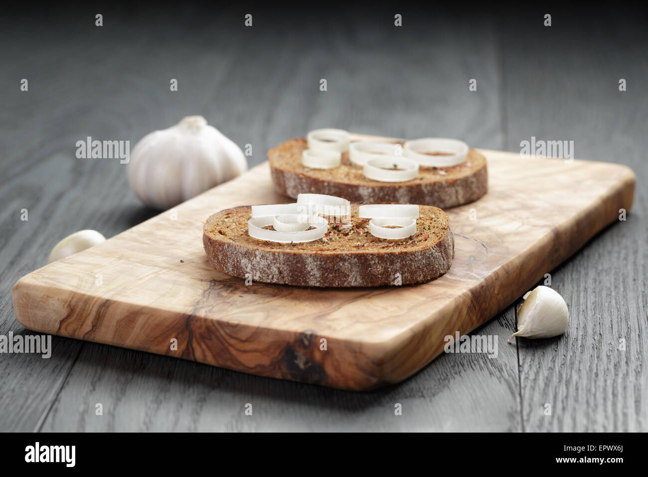 rye bread grated with garlic with leek, crostini Stock Photo - Alamy