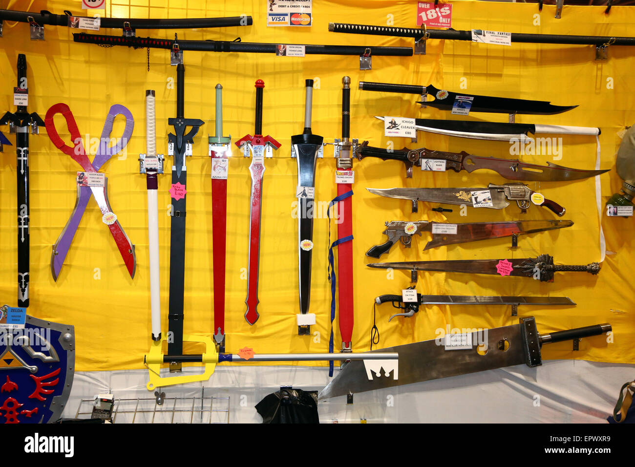 London, UK. 22nd May 2015. Character swords on sale at MCM Comic Con at ...