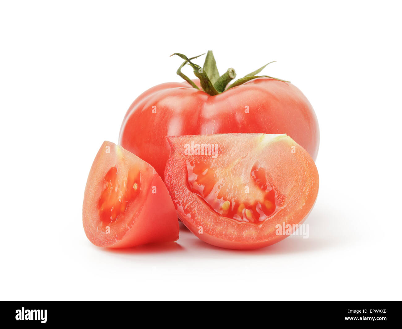 ripe tomatoes with sliced segments isolated Stock Photo - Alamy