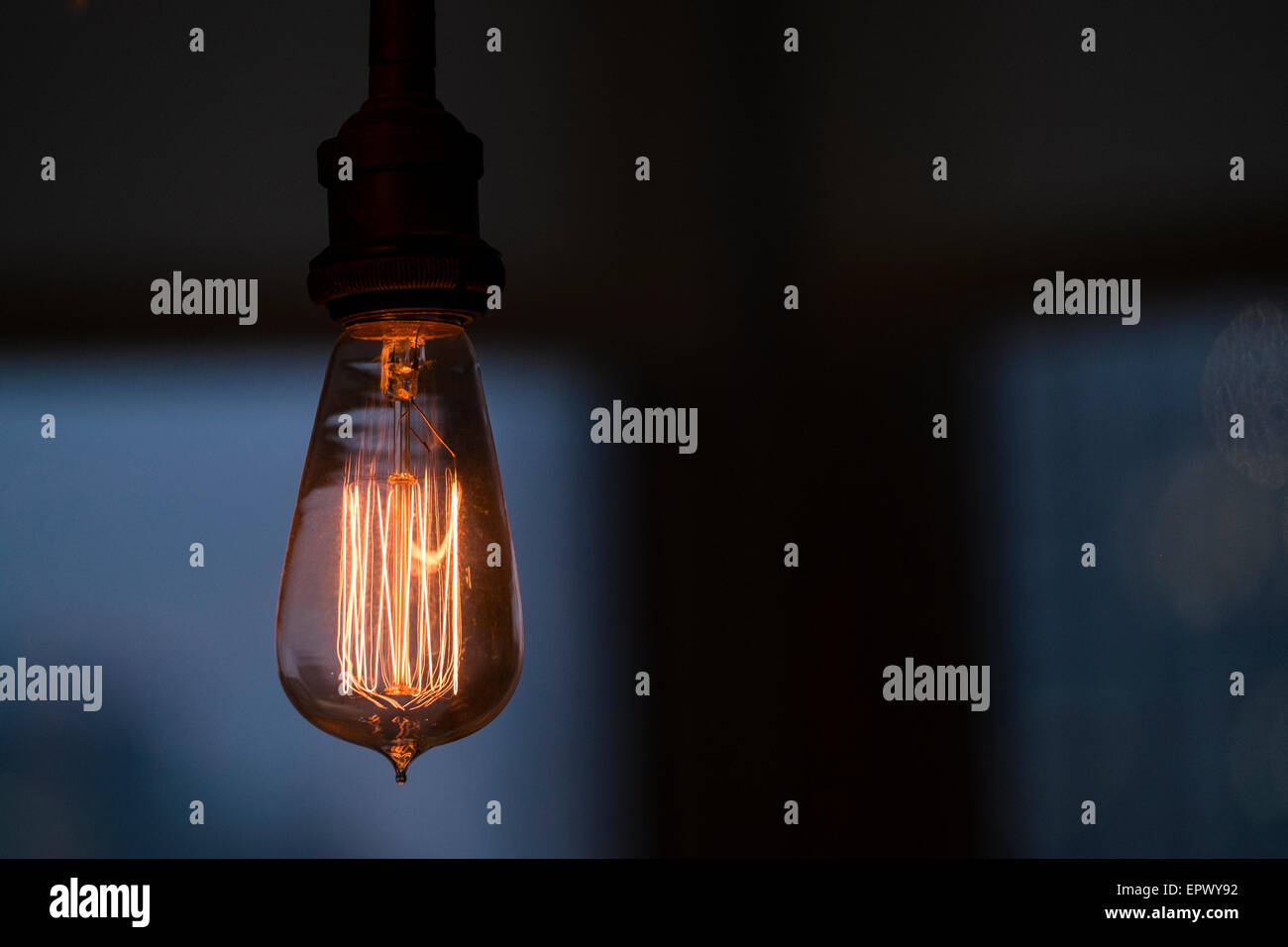 Light bulb filament close up lit up hi-res stock photography and images ...