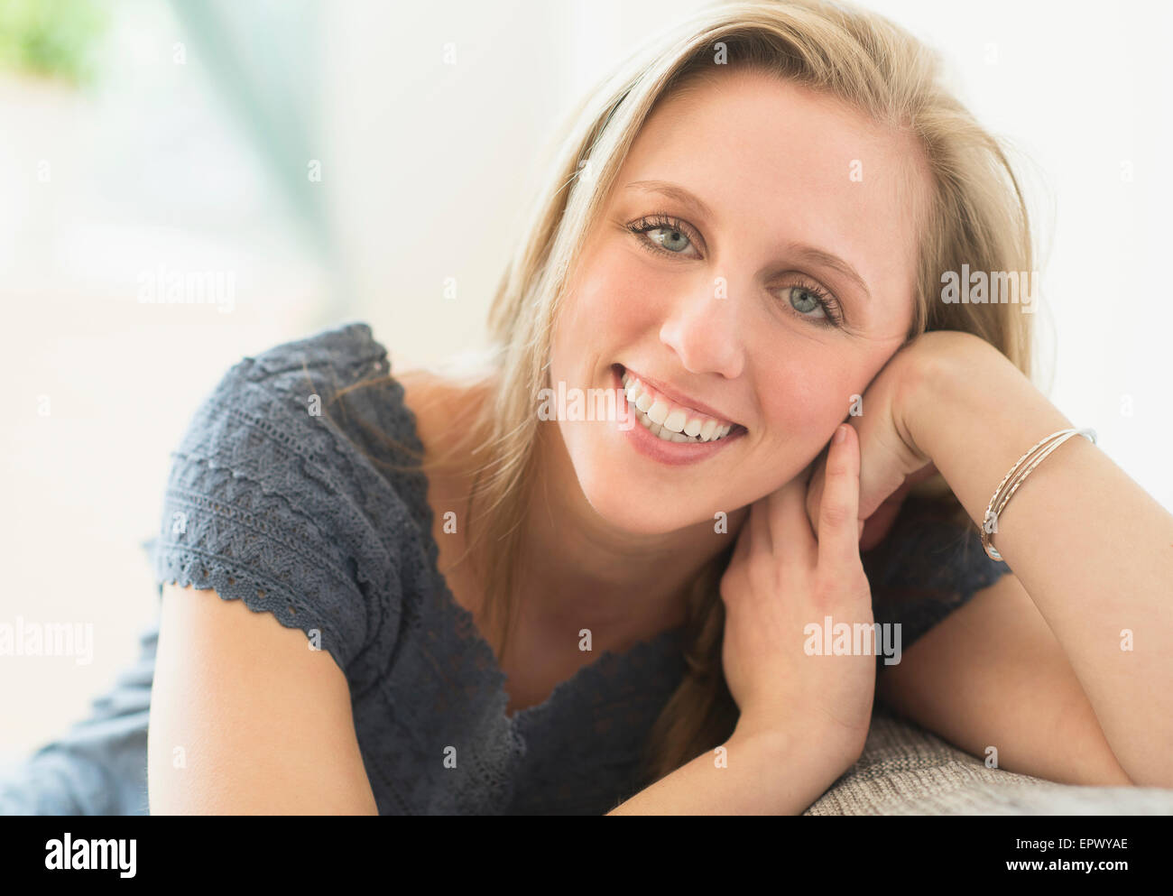 Portrait of woman smiling Stock Photo - Alamy