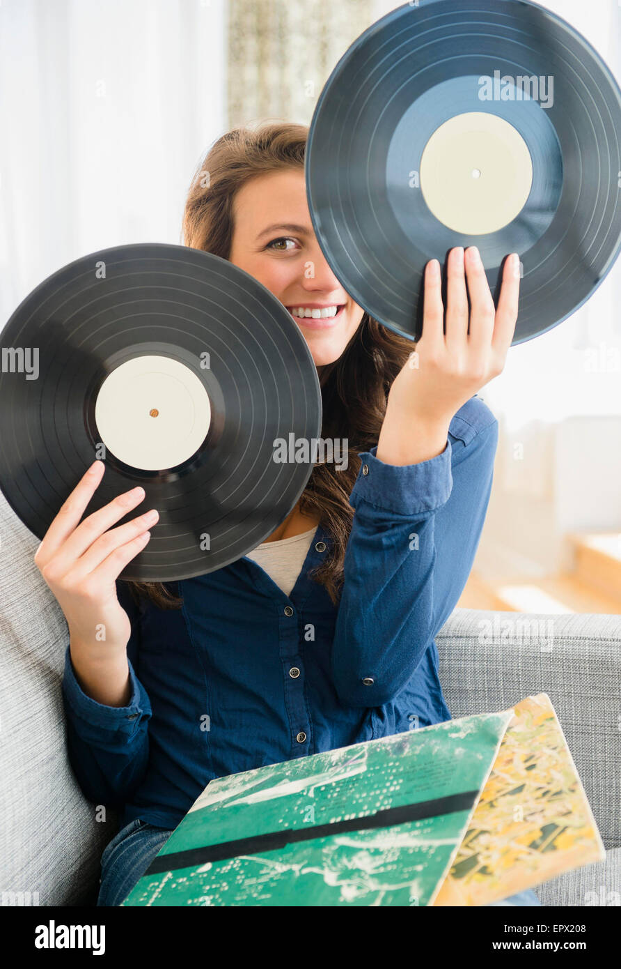 Woman holding two vinyl records Stock Photo - Alamy