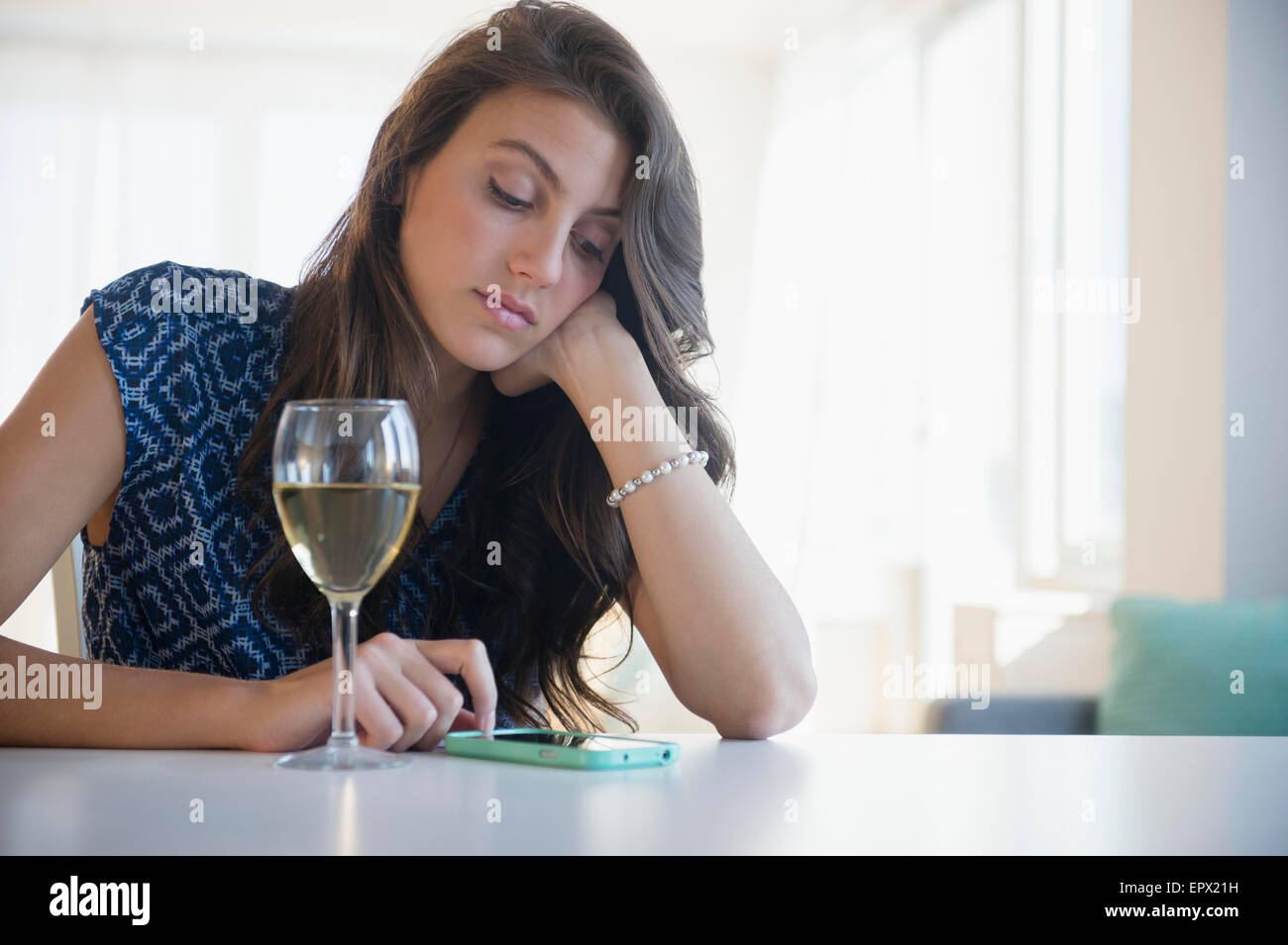Woman sits table glass hi-res stock photography and images - Alamy