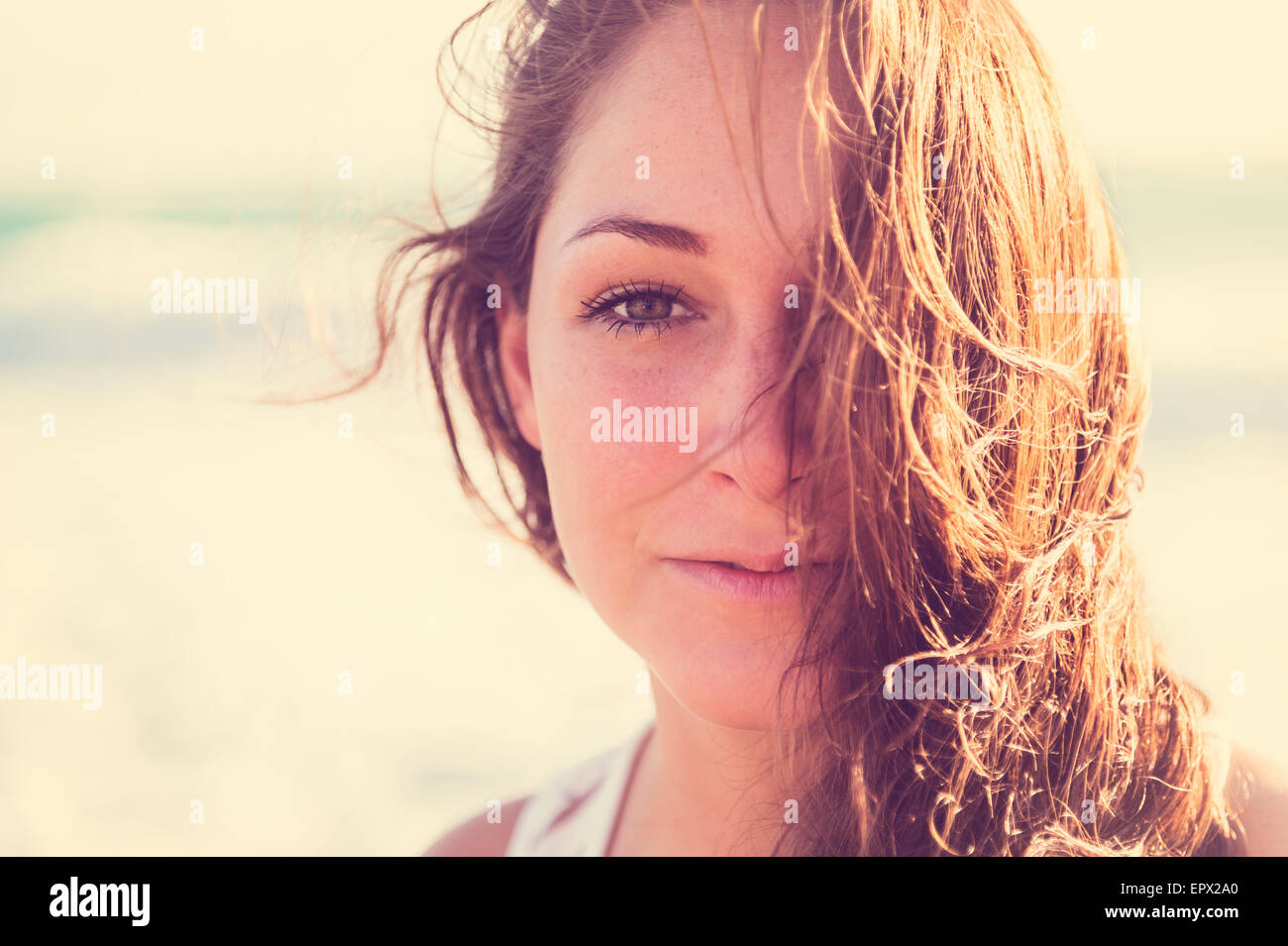 Portrait of woman on beach Stock Photo - Alamy